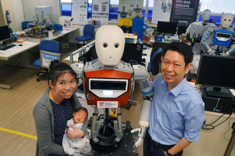 Singaporean robot-designing couple welcomes own human creation | The Star