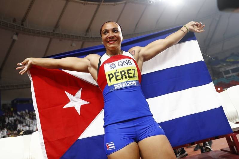 Athletics: Athletics: Cuba's Perez rewarded for persistence with discus ...