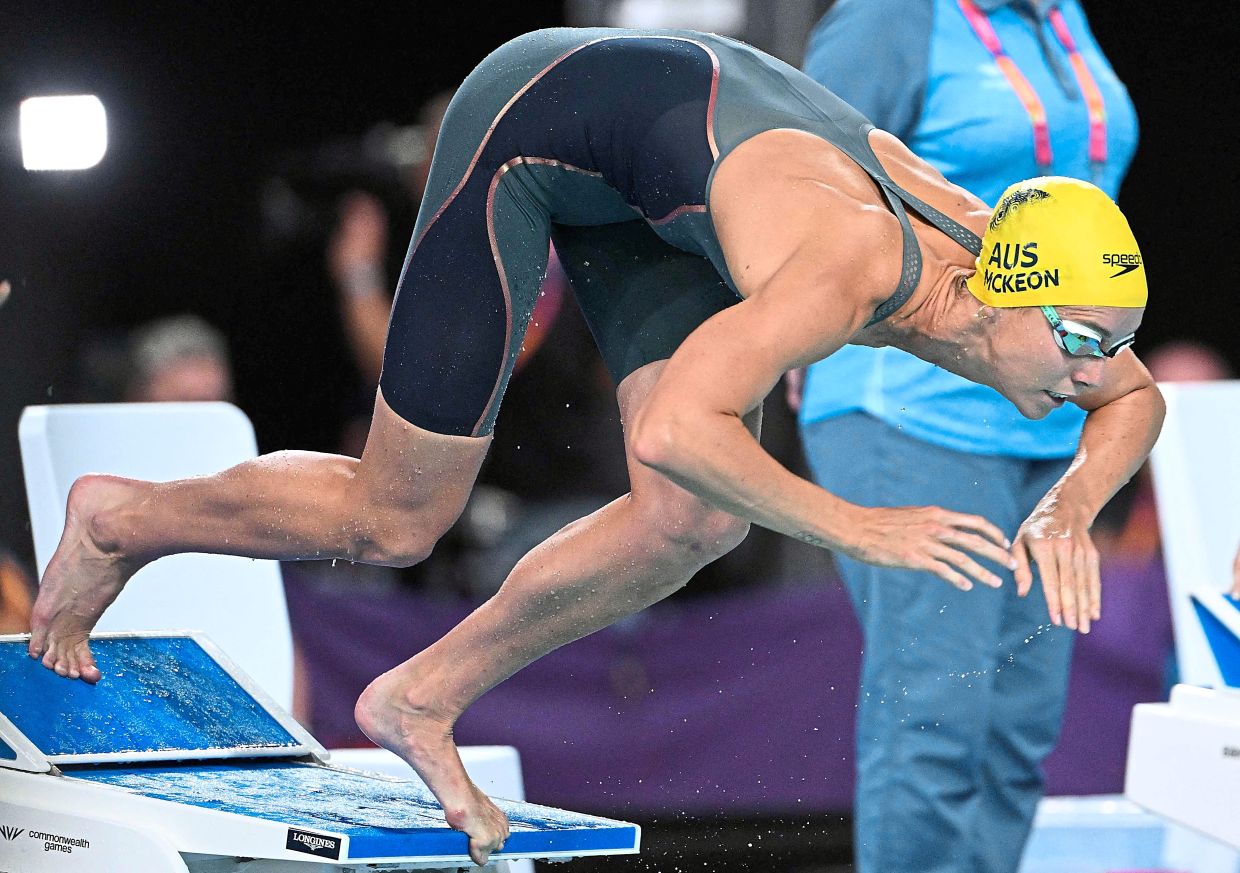 Swimming: Swimmer McKeon makes history, Kiplimo dances to 10,000m ...
