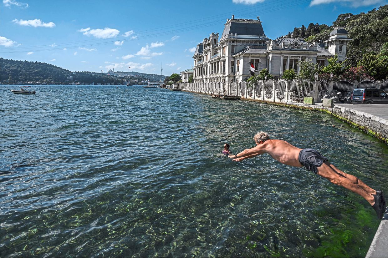 How locals are swimming between continents in Istanbul | The Star