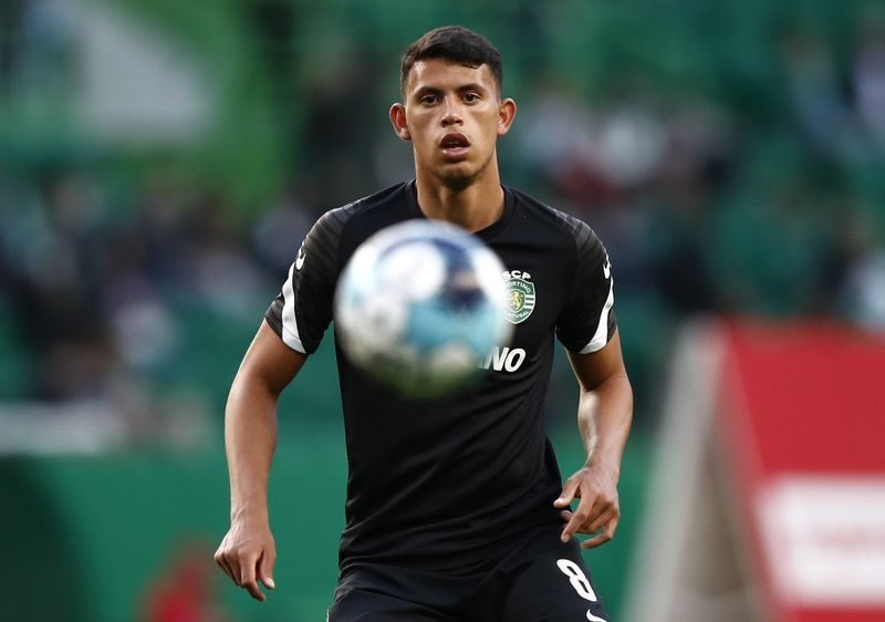 Football: Soccer-Wolves sign midfielder Nunes from Sporting for a club ...