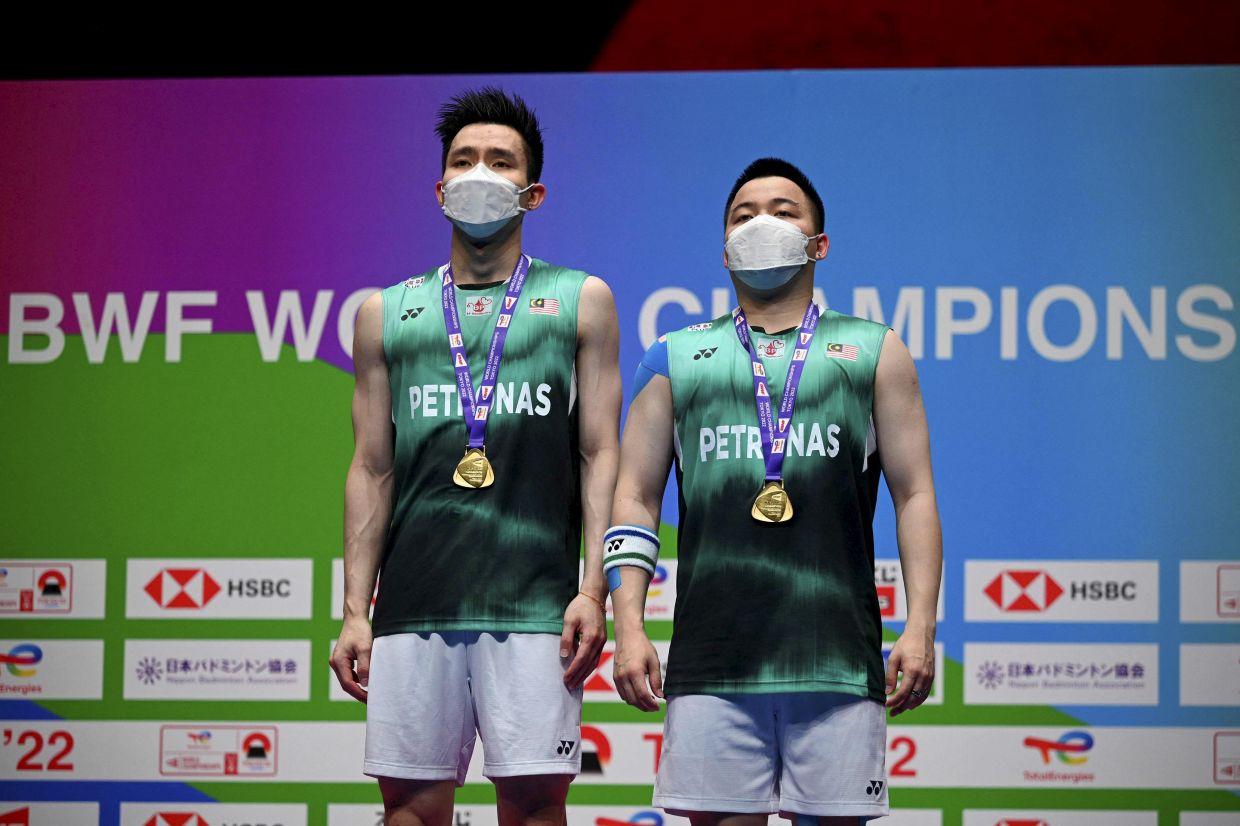 Invite world badminton champs Aaron-Woo Yik to join National Day parade ...