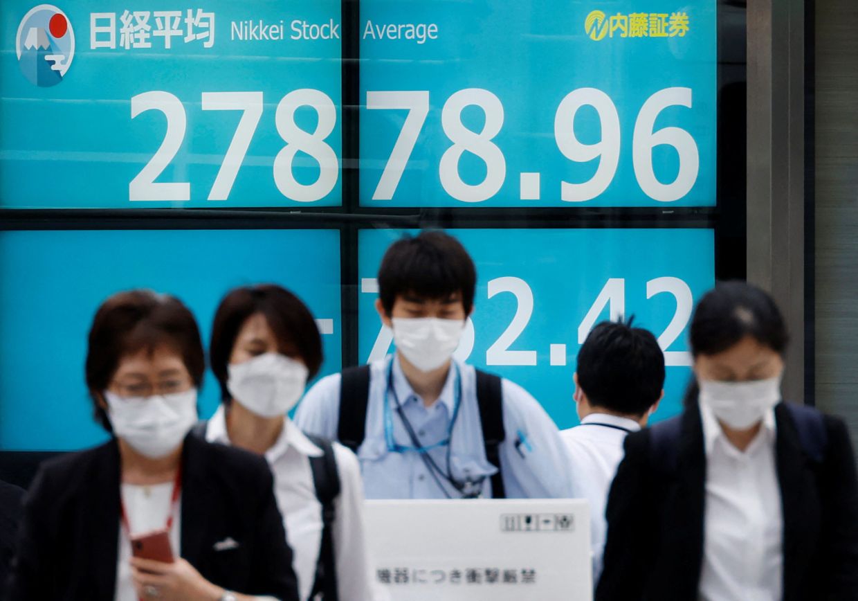 Asian markets mixed as traders prepare for more rate hikes | The Star