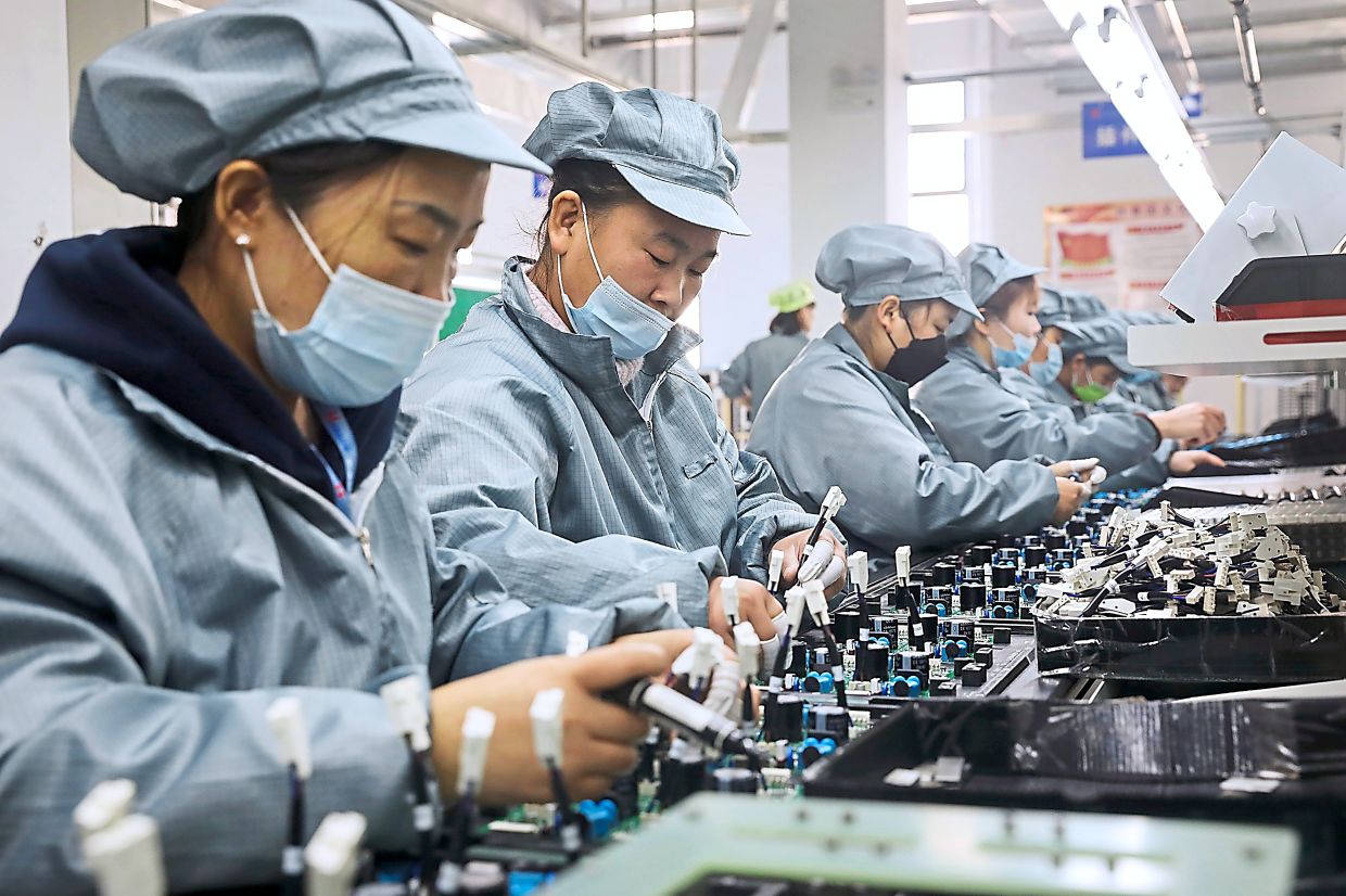 Industrial output enjoys robust month on policies | The Star