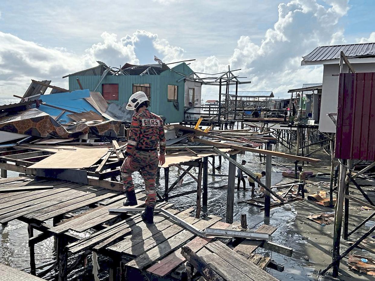 Strong winds destroy 15 homes in water village | The Star