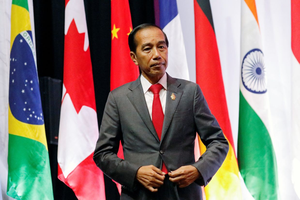 Soft-spoken Jokowi emerges as surprise power broker at G-20 | The Star