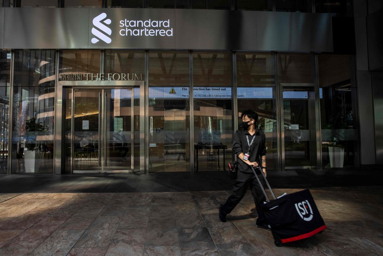 StanChart told to probe suspicious credit card charges in Hong Kong ...