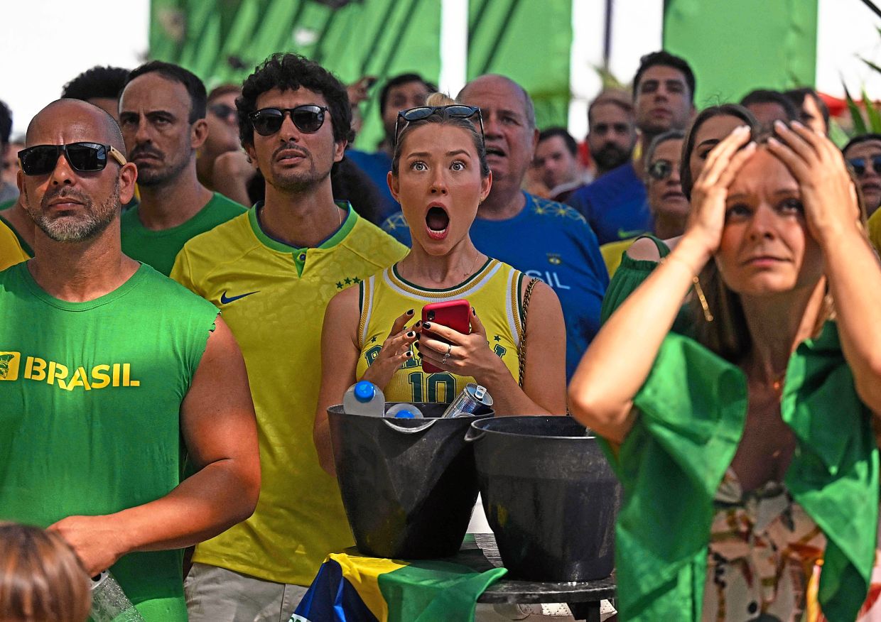 Football: Fans in disbelief as Selecao crash out in last eight | The Star