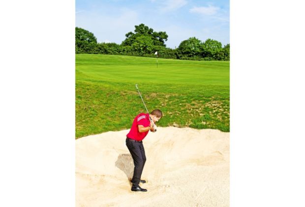 Golf: Plugged lie in a bunker | The Star