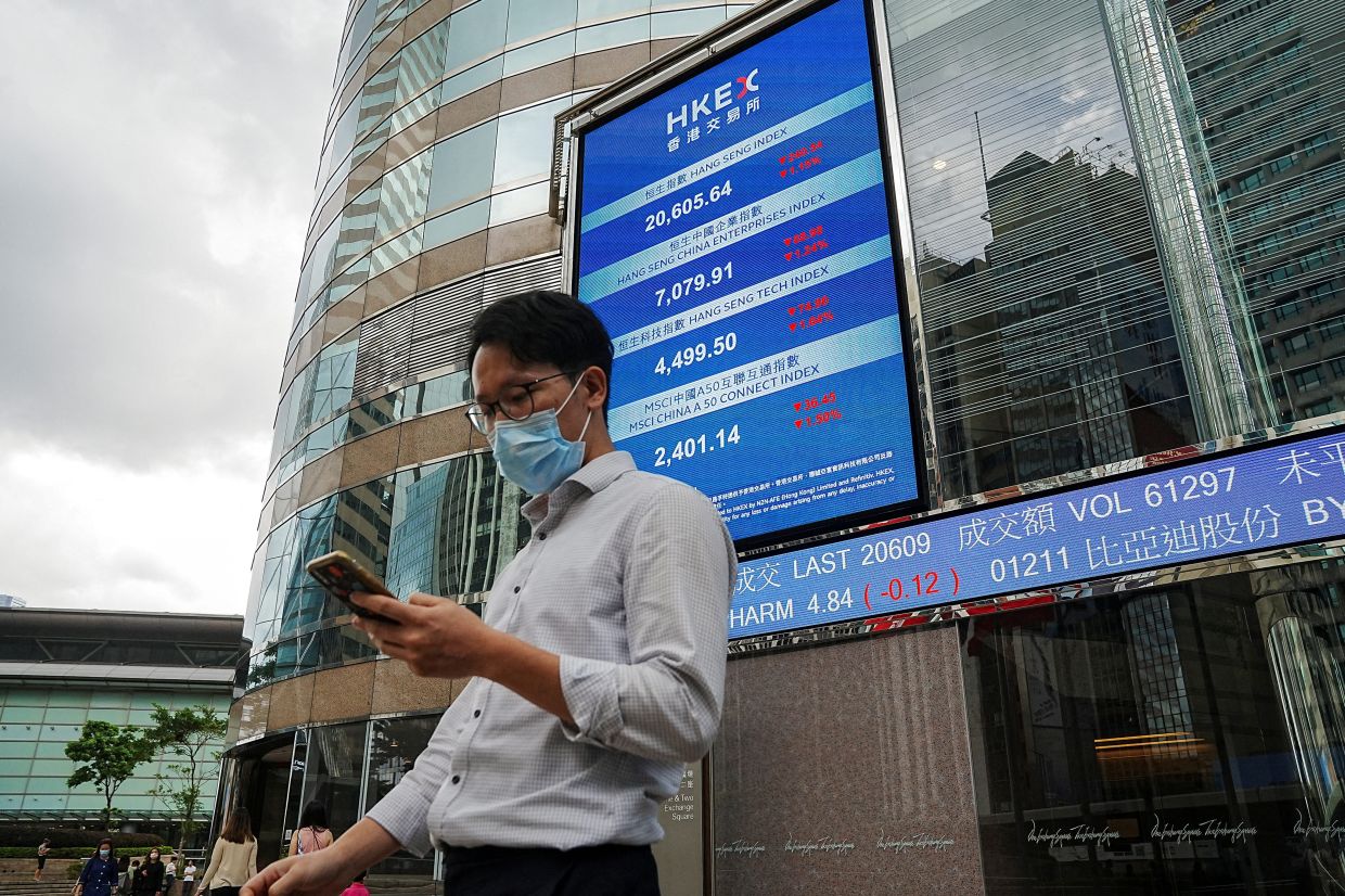 Asian markets rise again as traders consider China reopening | The Star