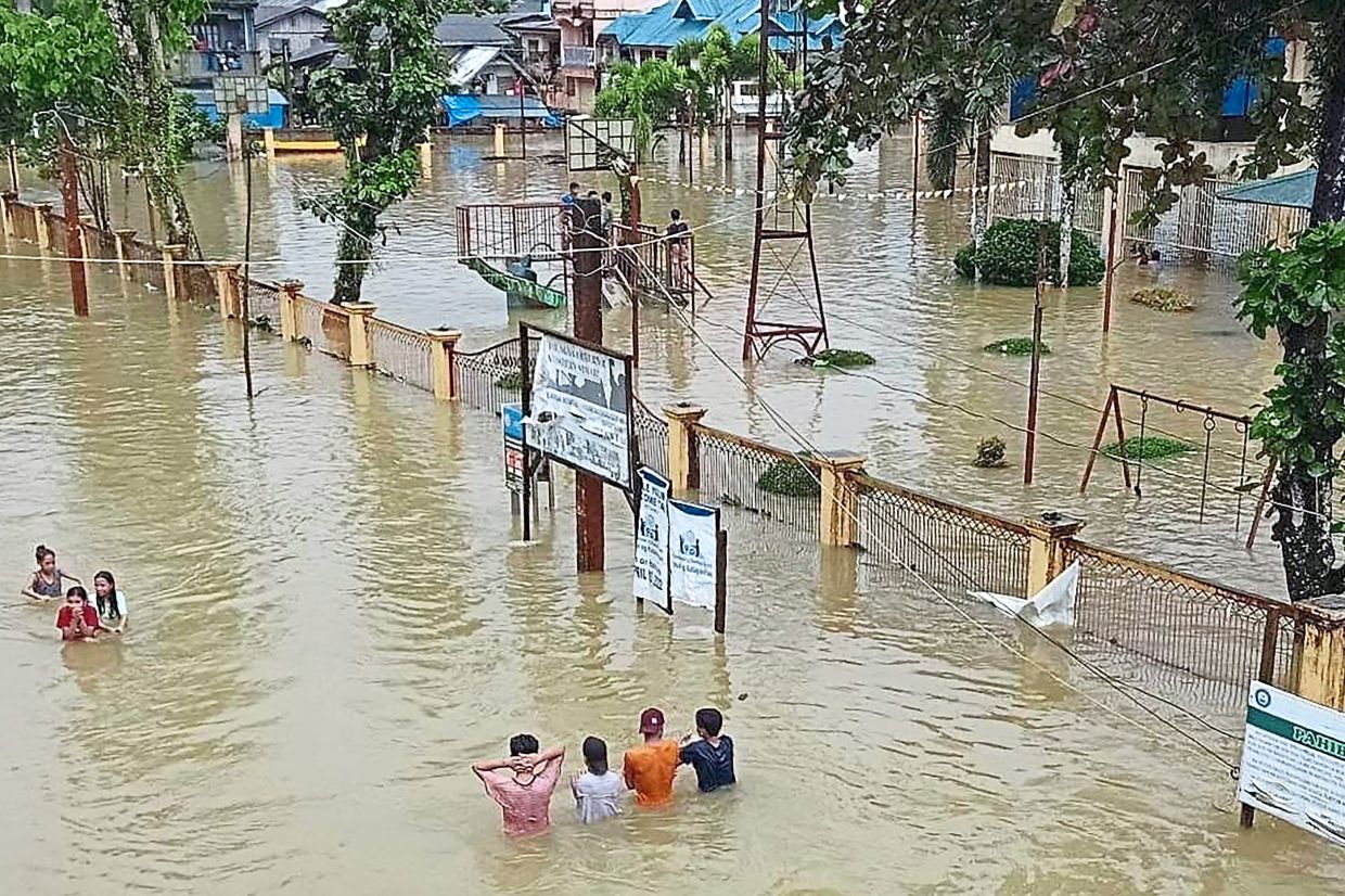 At least 11 killed in Philippine storms | The Star