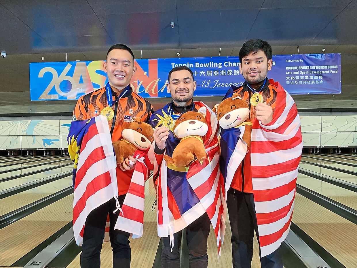 Bowling: Rafiq, Timmy and Muaz defend trios gold in style | The Star