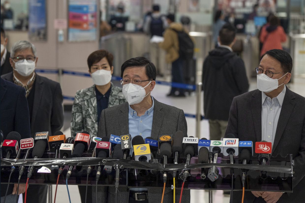 HK leader hopes to end mandatory mask wearing this year | The Star