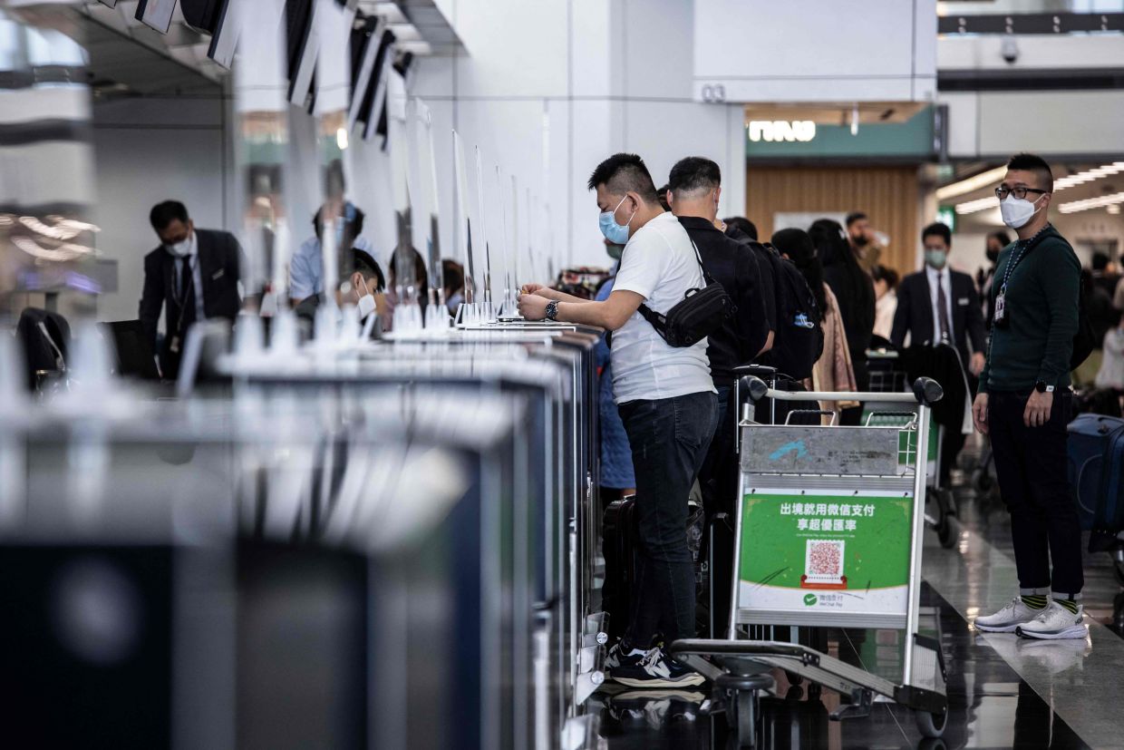 Hong Kong to remove mandatory quarantine for Covid infections | The Star