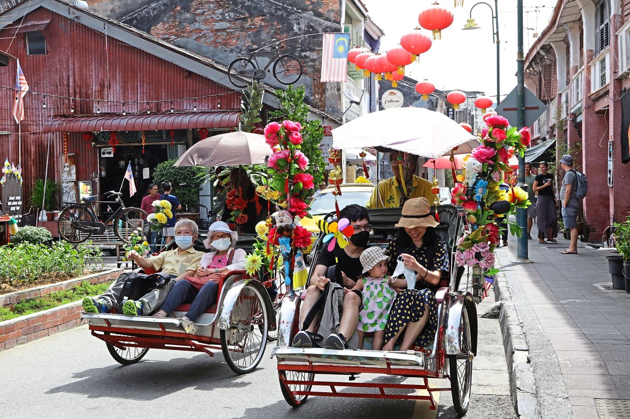 Trishawmen hope for ‘ang pow’ rides | The Star