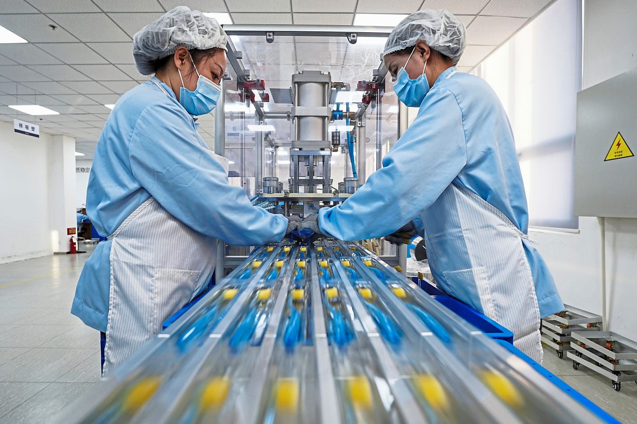 China economic activity swings back to growth in January - official PMI ...