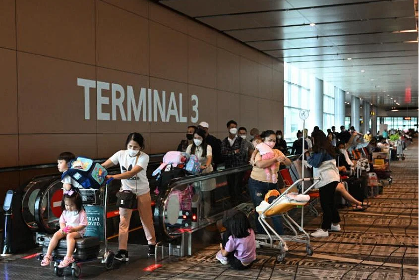 Passenger numbers at Changi Airport rebound to 50% of pre-pandemic ...