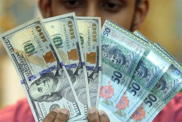 Ringgit likely to be in tight range against the greenback ahead of Bank ...