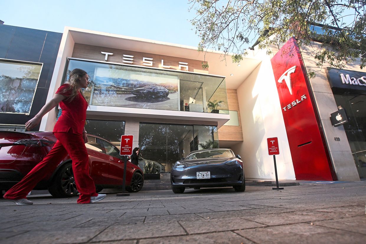 Tesla deliveries rise to a record high post-price cut | The Star