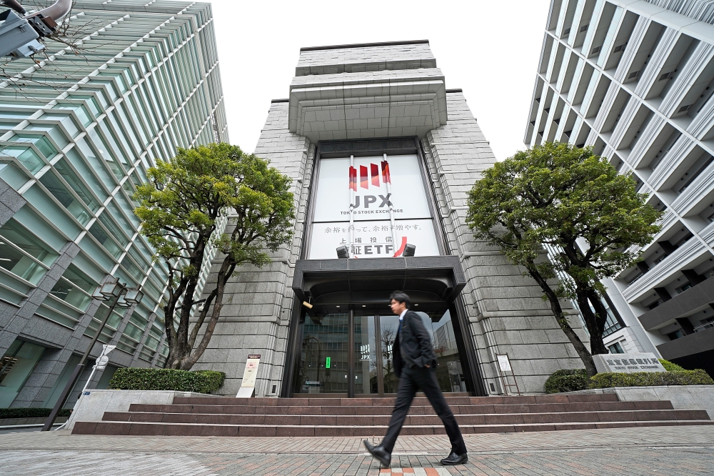 Japan's Nikkei crosses 29,000 as yen weakens on BOJ's dovish stance ...