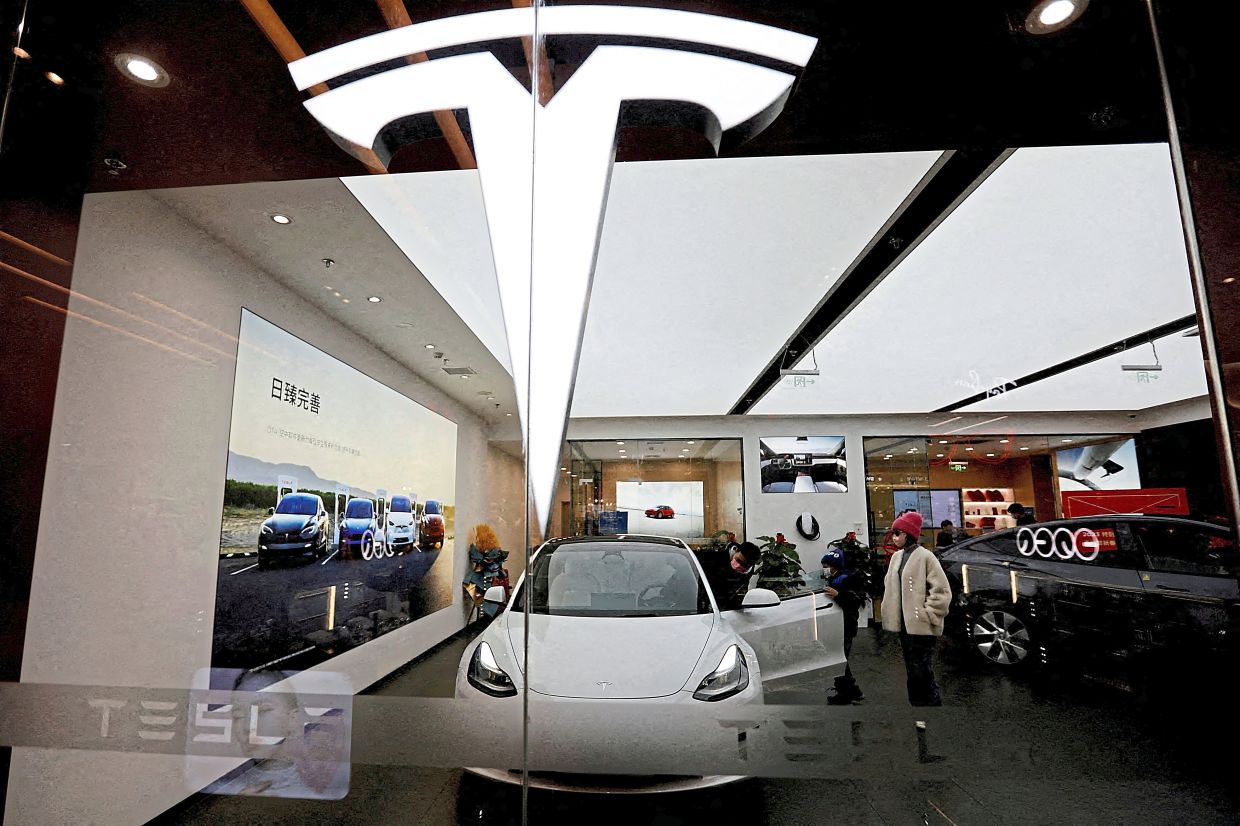 The reason Tesla keeps changing its car prices | The Star