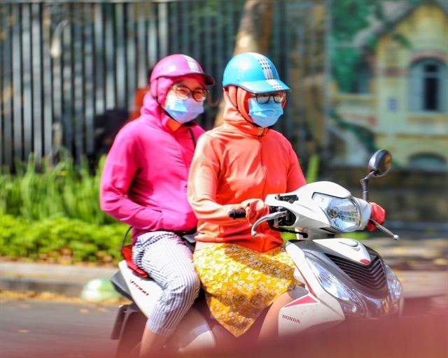 ‘Wear less-stuffy clothing’: Ho Chi Minh City tries to save power as ...