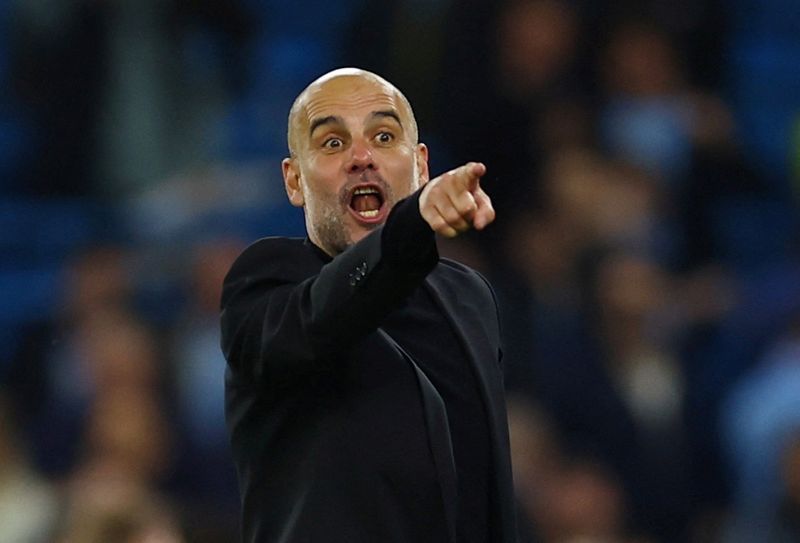 Football: Soccer-Guardiola says Premier League most important of three ...
