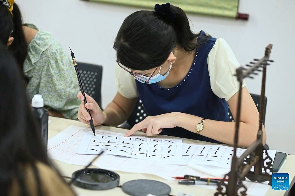 Students learn calligraphy during summer vacation | The Star
