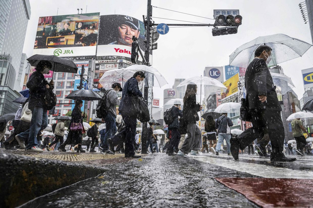 Tropical Storm Mawar intensifies rains for Japan, threatens floods and ...
