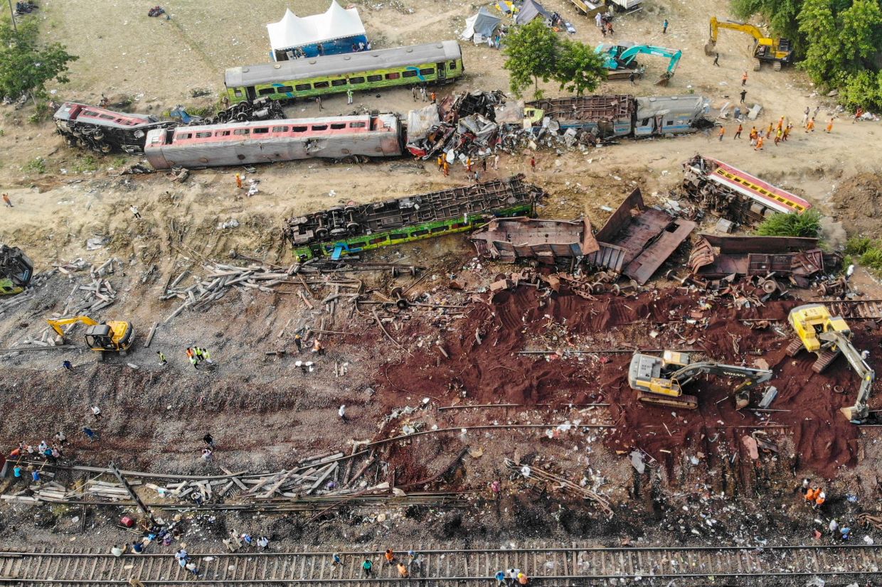 Indian officials search for answers after train crash kills at least ...