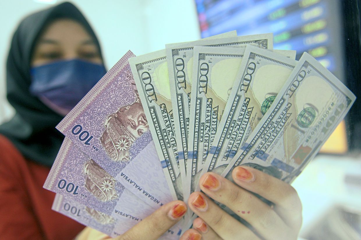 Ringgit ends lower against US dollar on weak demand | The Star