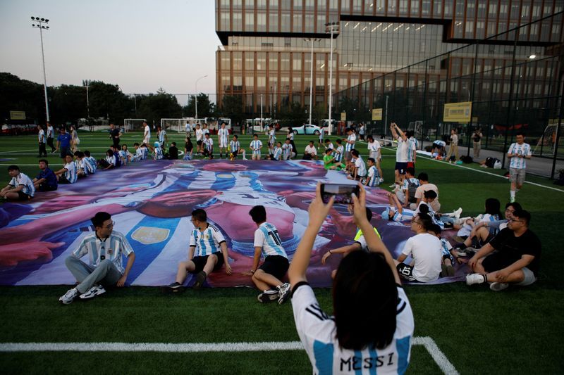 Football: Soccer-Chinese superfan rejoices as Messi visits Beijing ...