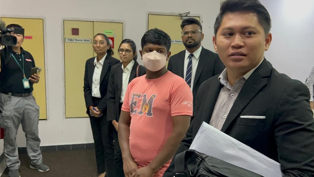 Foreign worker claims trial to bribery charge | The Star