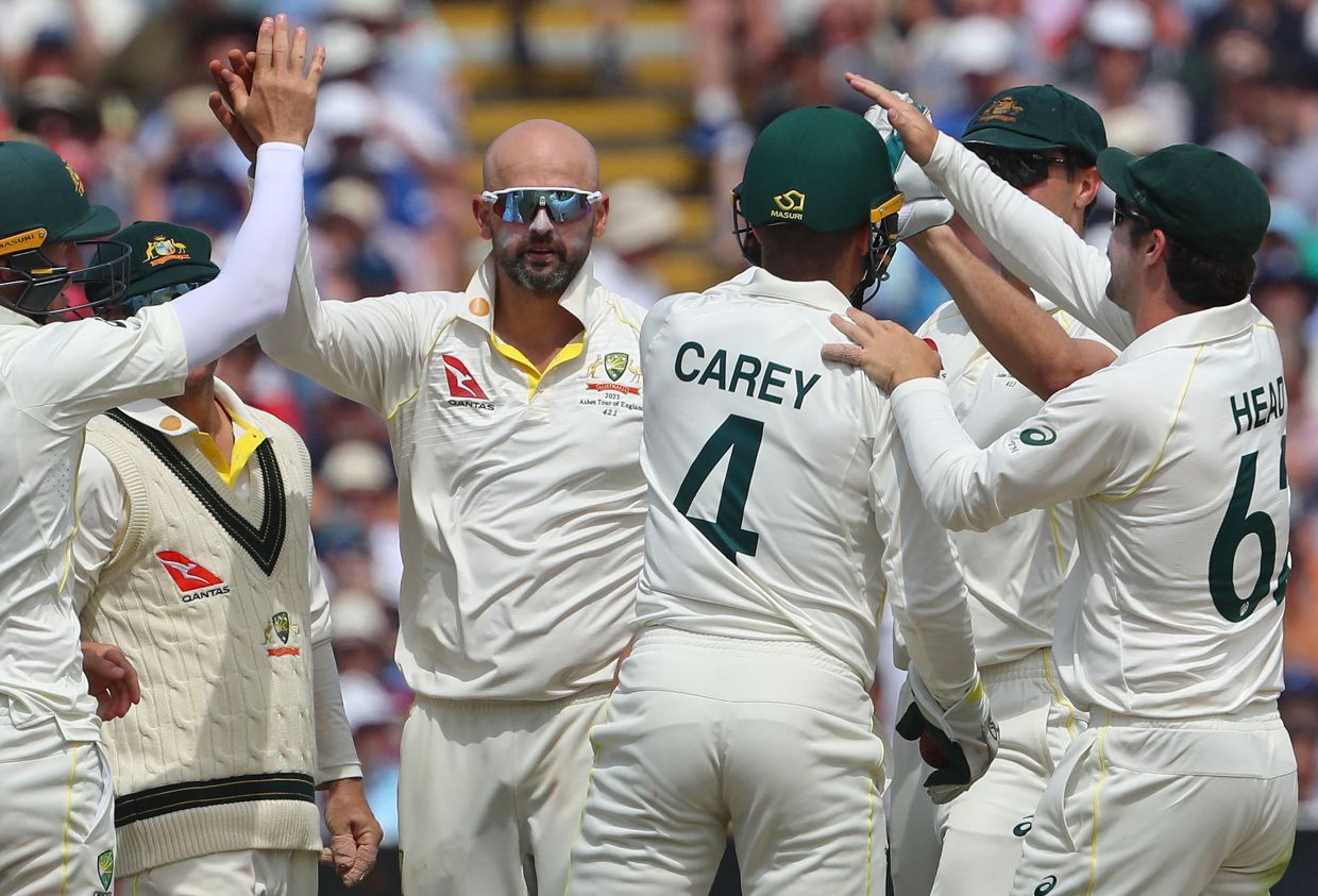Australian spin king Lyon dismisses Root to slow England charge in ...