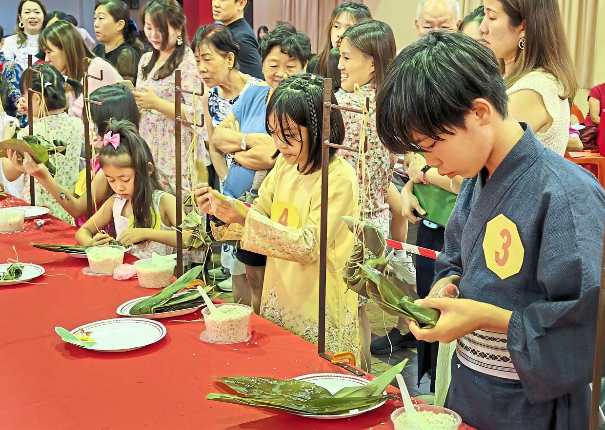 Children all wrapped up in dumpling tradition | The Star