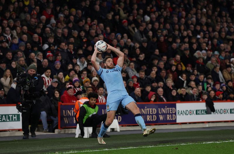 Football: Soccer-Wrexham's Tozer slams EFL towel ban for throw-ins ...