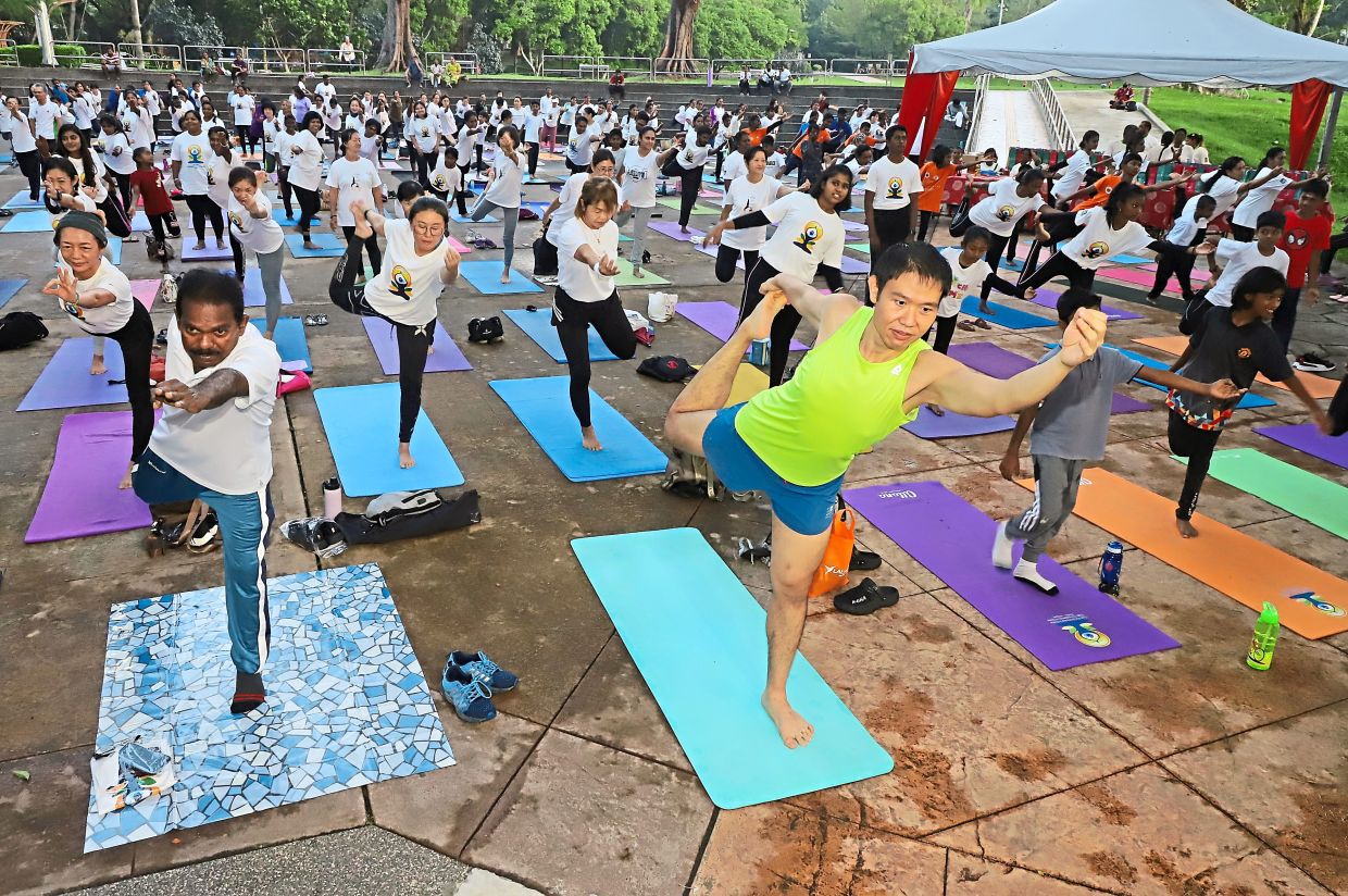Mass yoga session bringing positive vibes | The Star