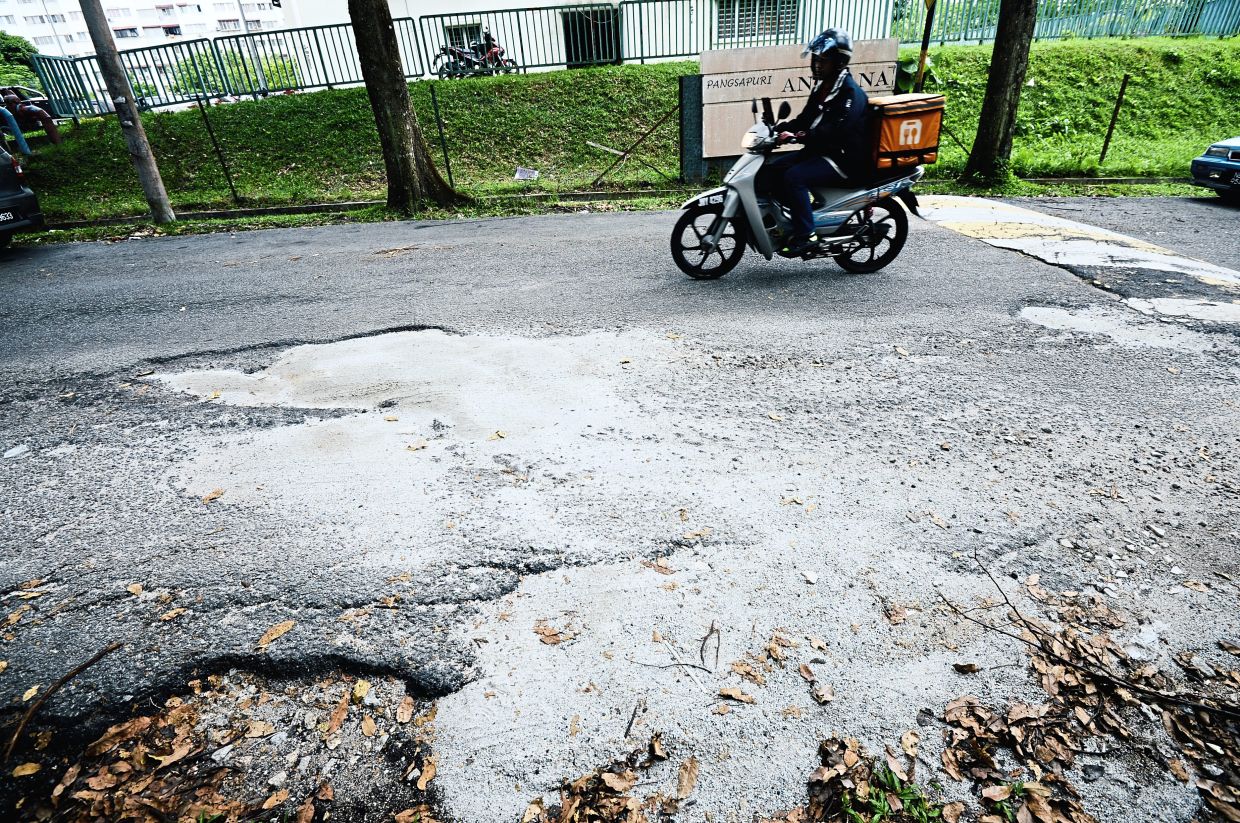 MPKj to spend RM20,000 on road repairs outside apartment | The Star