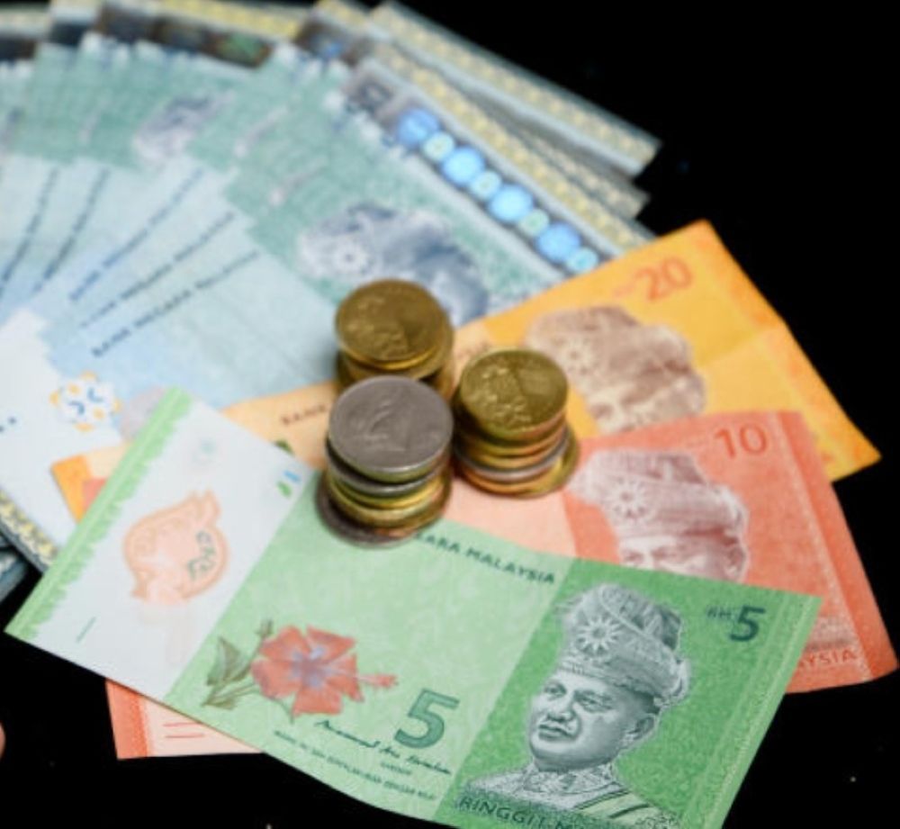 Ringgit ends almost flat against US dollar | The Star