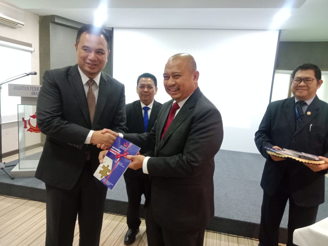 Public Service Department launches guide book and code of ethics | The Star