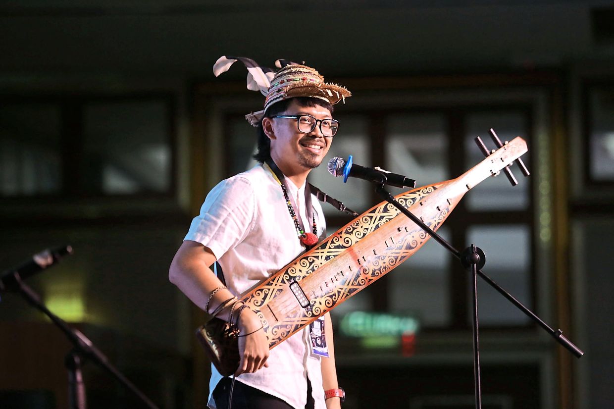 This Kenyah man is keen on introducing the sape to a bigger audience ...