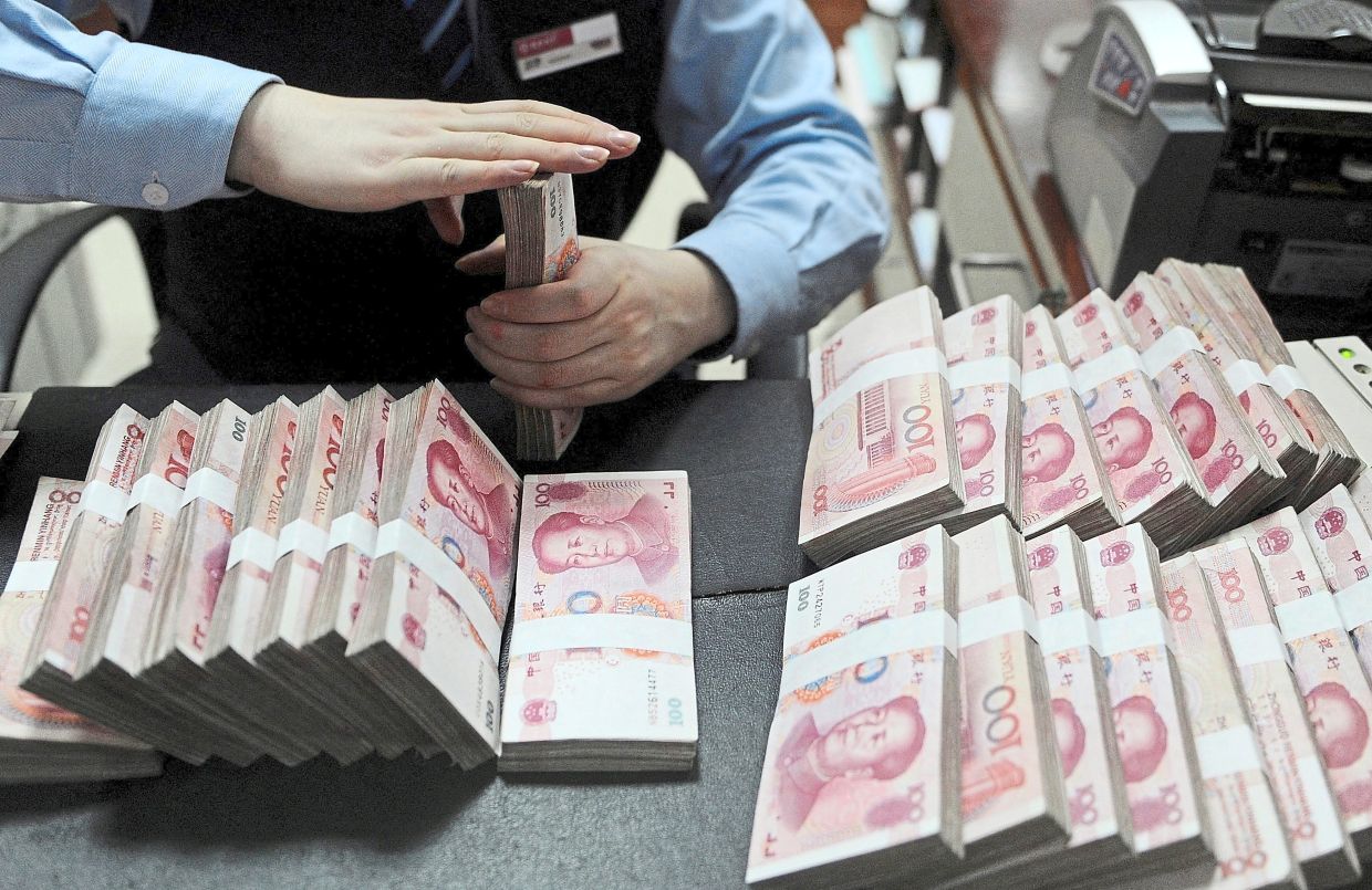 Yuan jumps as Beijing vows to bolster economy | The Star