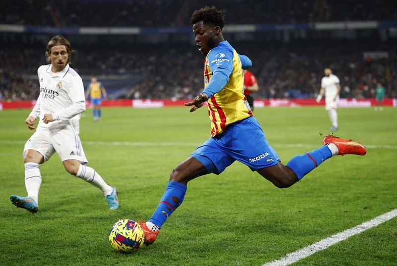 Football: Soccer-Milan sign American midfielder Musah from Valencia ...