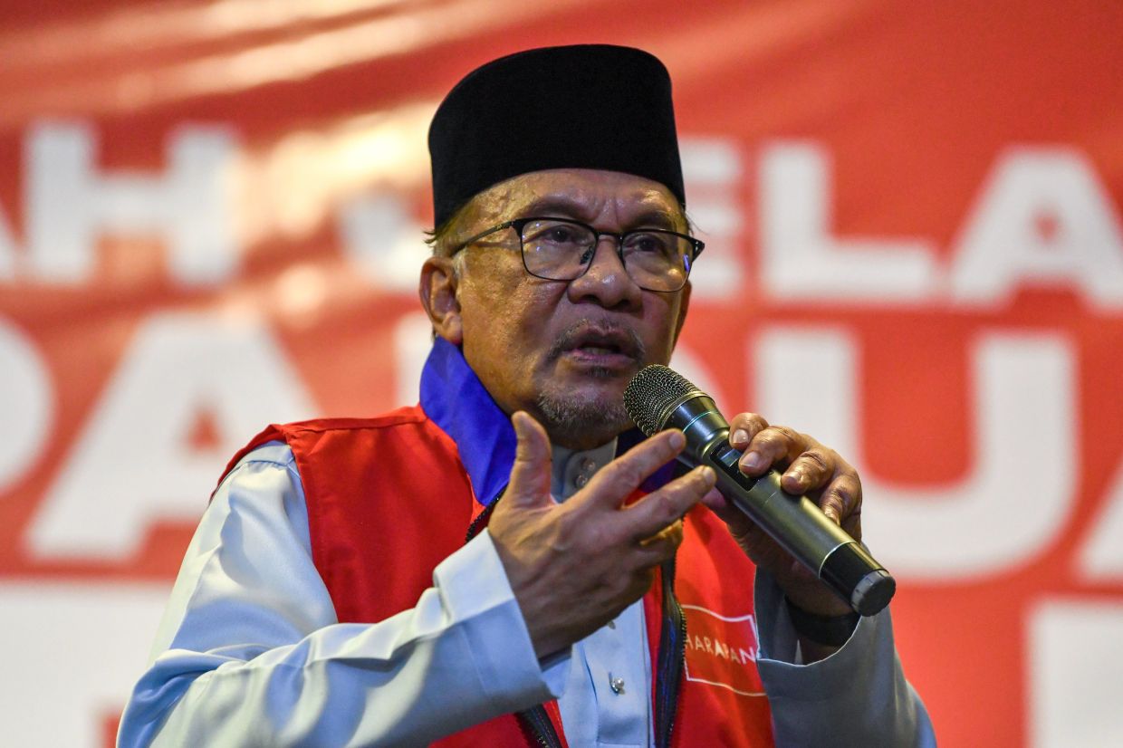 Don't run away, step up and face the music, Anwar advises Muhyiddin's ...