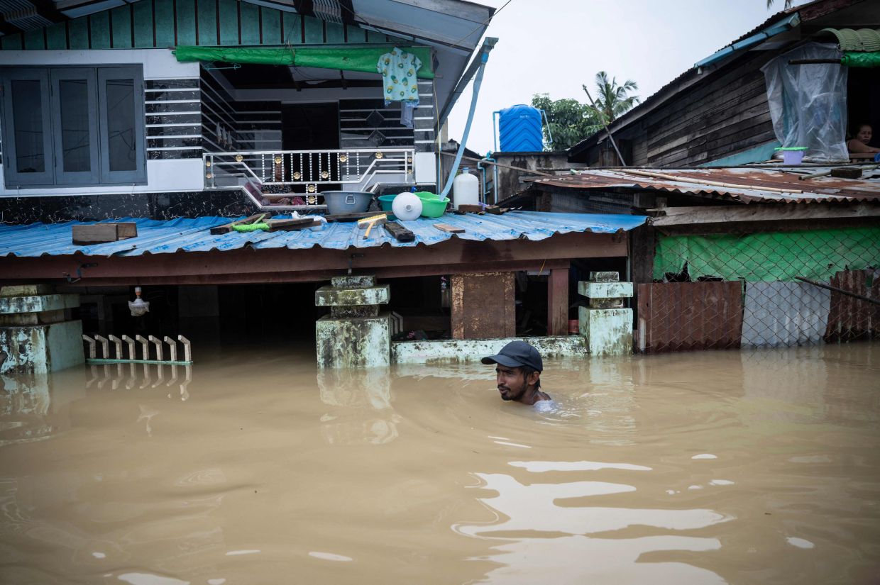 Waiting to go home: 48,000 have now been evacuated in Myanmar floods ...