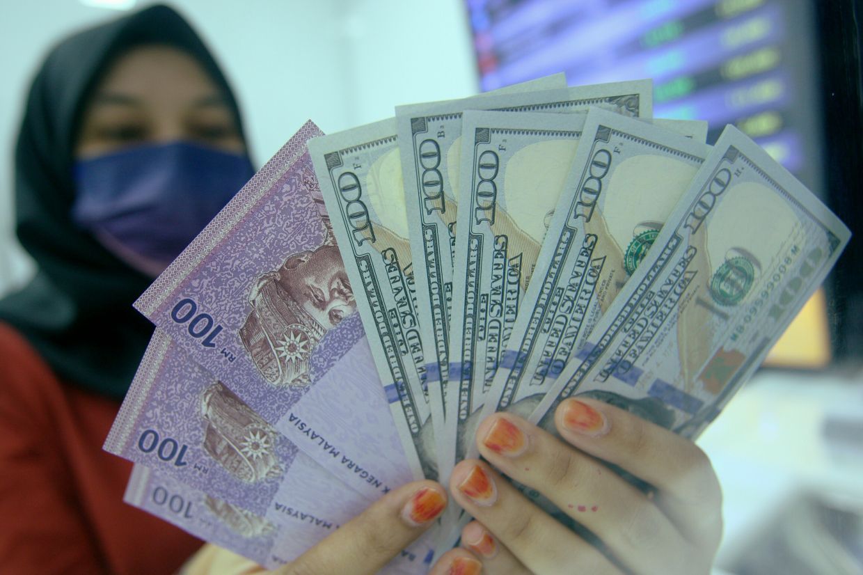 Ringgit likely to trade between RM4.57 and RM4.60 against the US dollar this week | The Star