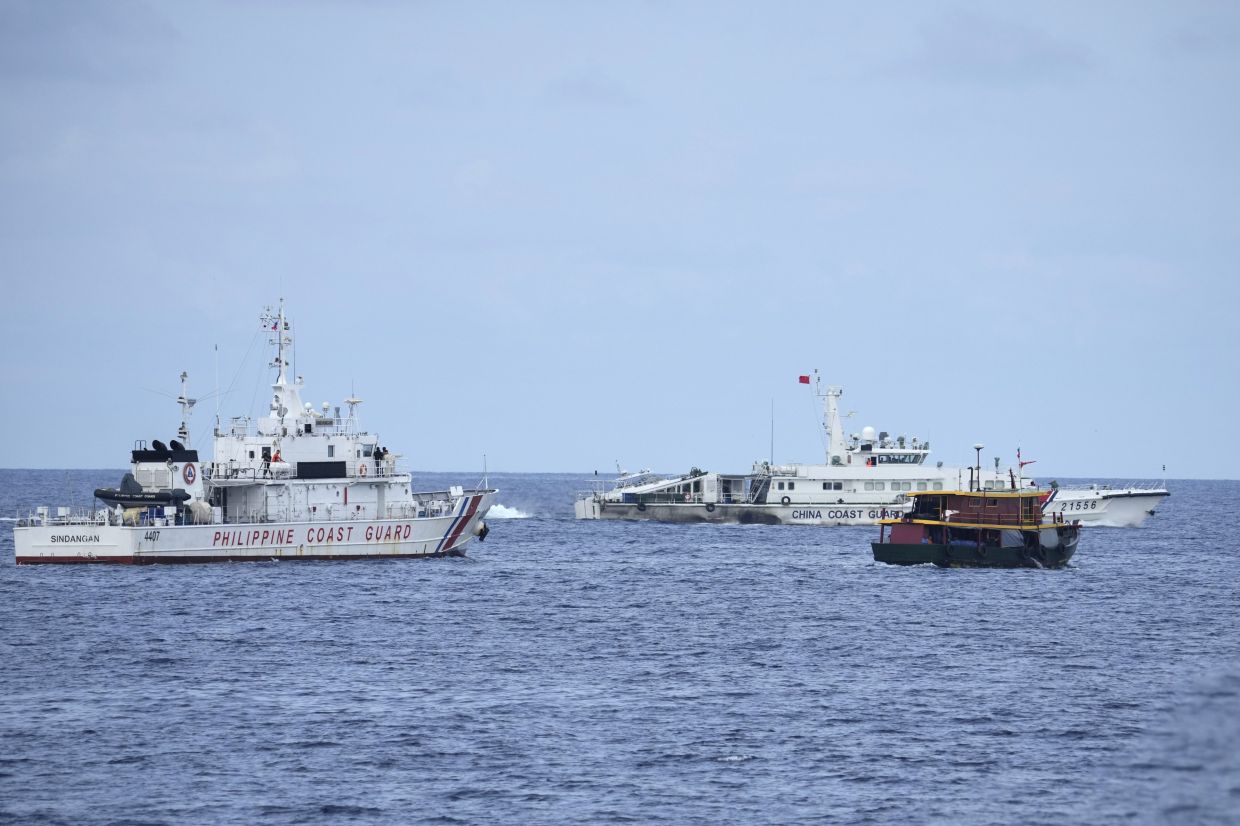 Chinese Ships Chase Block Philippine Supply Boats In Disputed Sea Chinese Ships Chase Block Philippine Supply Boats In Disputed Sea