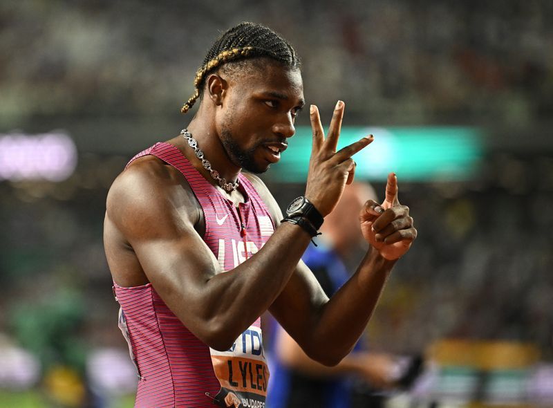 Athletics: Athletics-Lyles completes sprint double with third straight ...