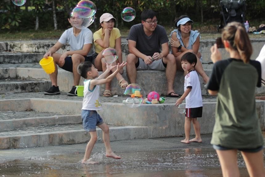 Children up to age six to get S$400 top-up in Child Development Account ...
