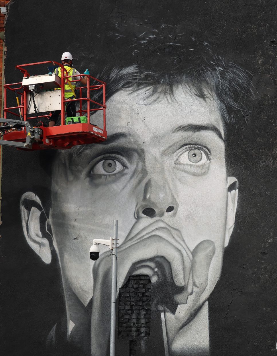 Mural of Joy Division's Ian Curtis returns to Manchester | The Star